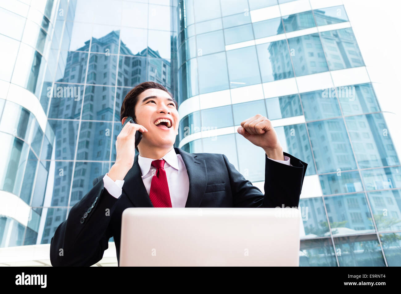 Cheering business man sitting laptop hi-res stock photography and ...