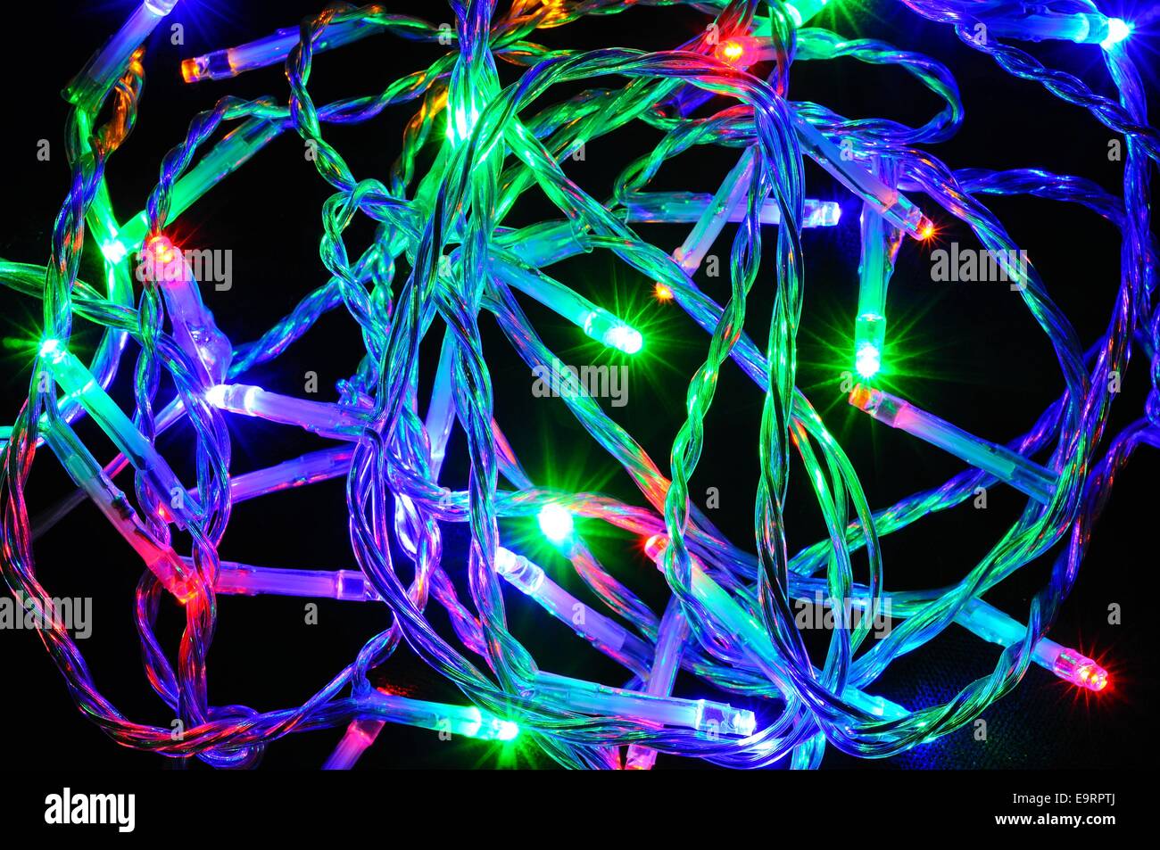 Modern Christmas LED lights against a black background Stock Photo - Alamy