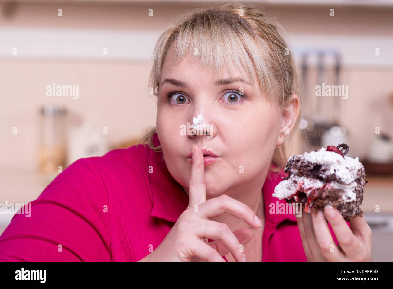 Young overweight woman wanting to eat secretly big cake Stock Photo - Alamy