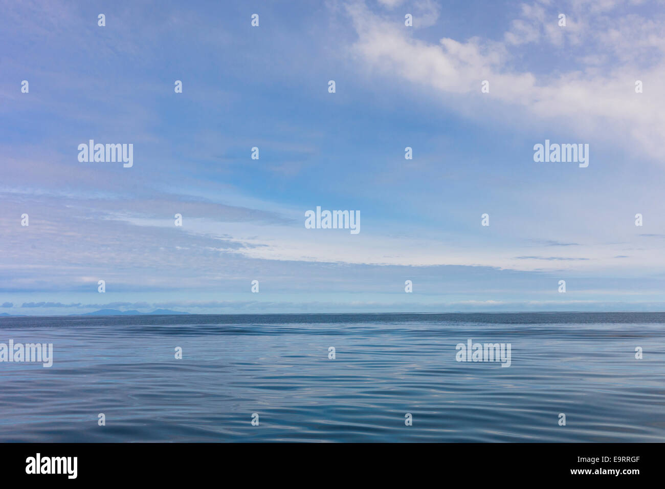Pastel blue shades of tranquil calm waters of sea and sky scene, Isle ...