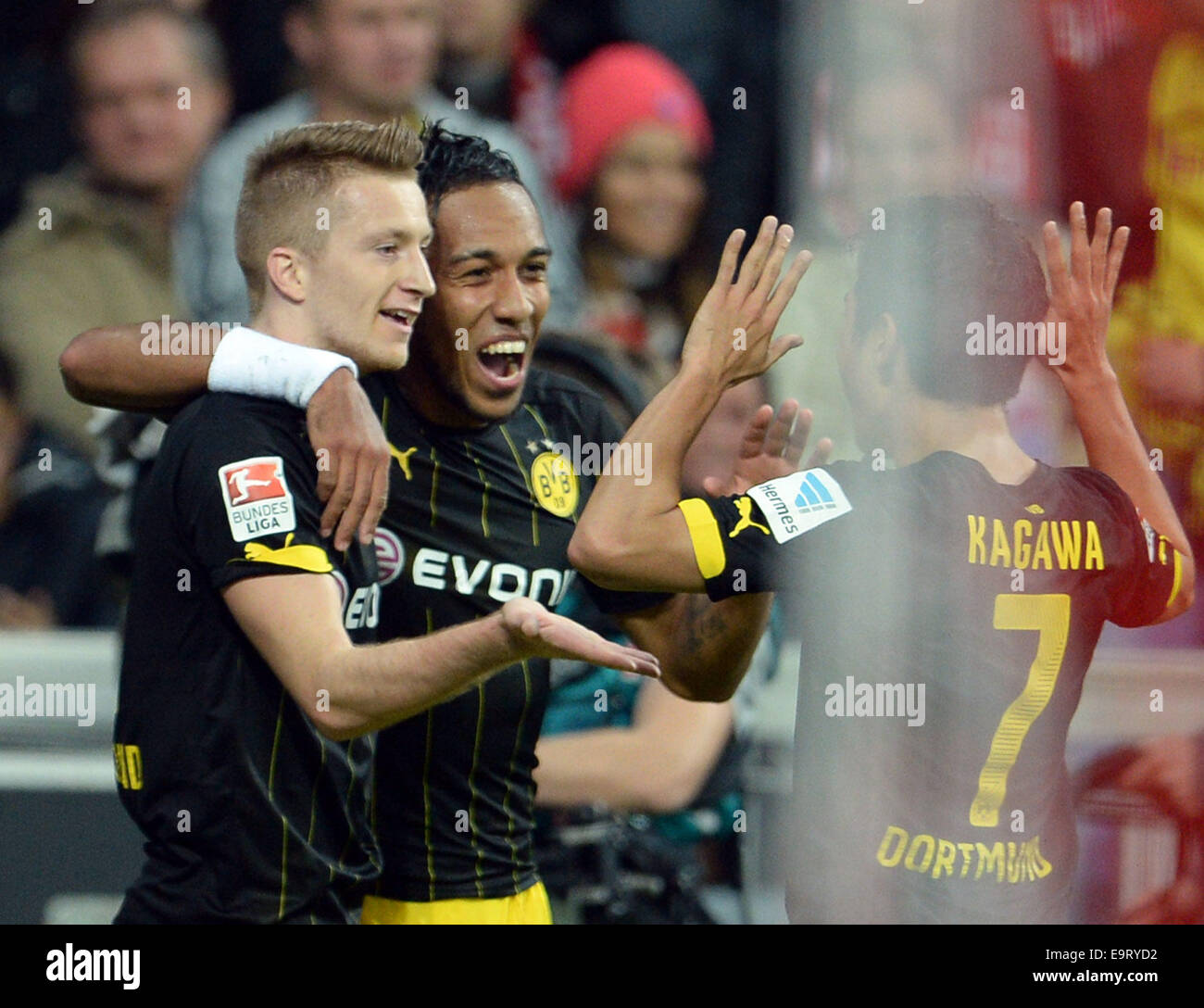 Munich, Germany. 01st Nov, 2014. Munich's Marco Reus (L-R) celebrates ...
