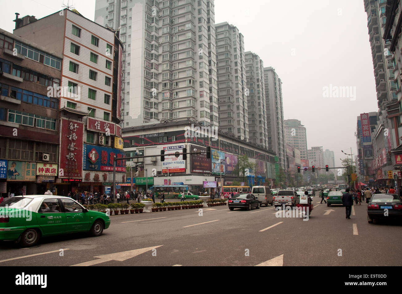 Taxi and cars on the street of Kaili, Guizhou Province, China Stock ...