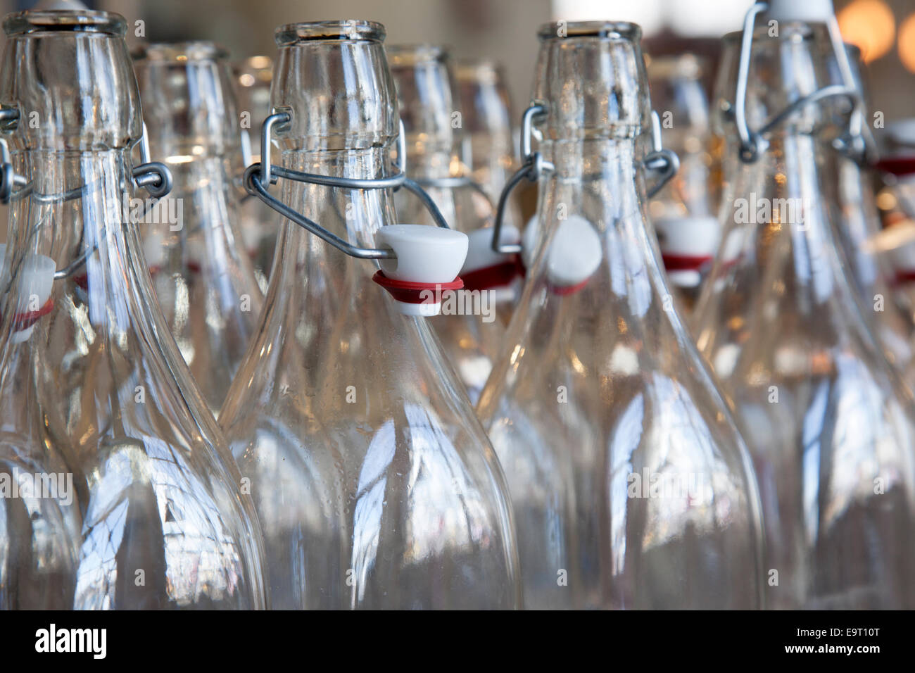 Stacked Glass Bottles in Restaurant Setting Stock Photo - Alamy