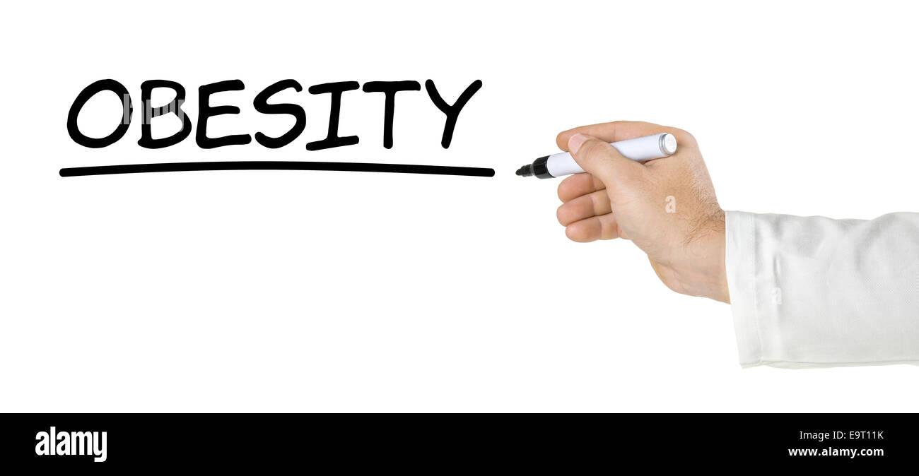 Hand with pen writing the word Obesity Stock Photo - Alamy