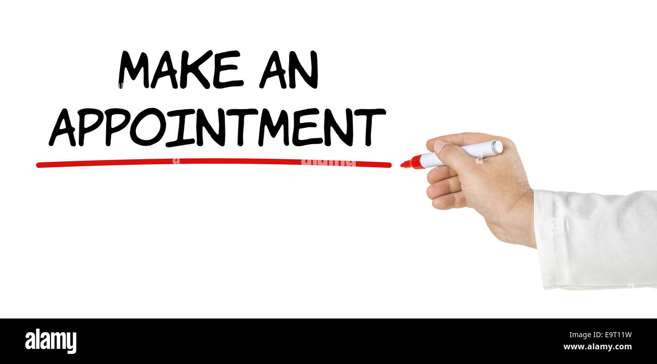 Hand with pen writing Make an appointment Stock Photo - Alamy