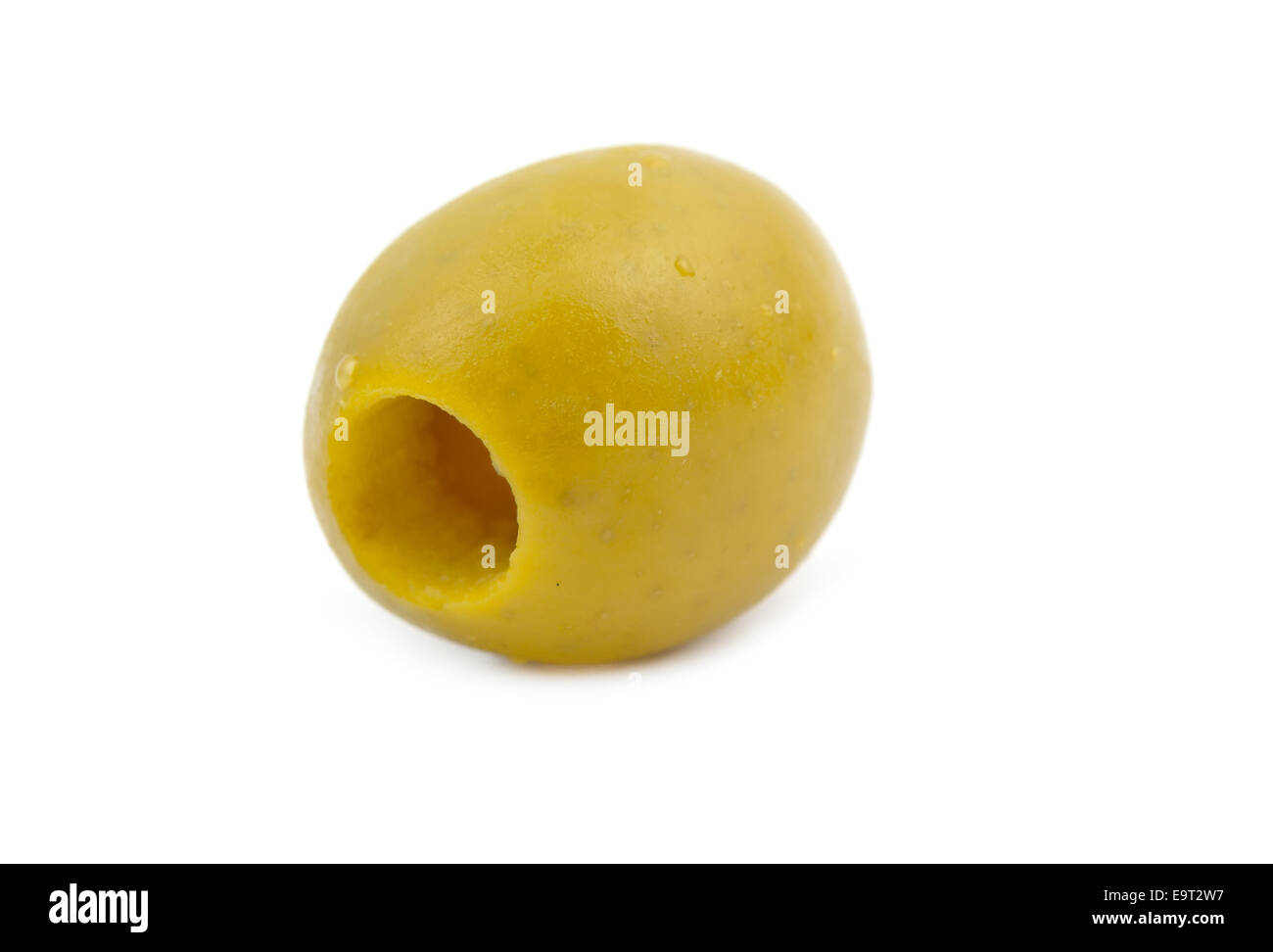 single olive isolated on white Stock Photo - Alamy