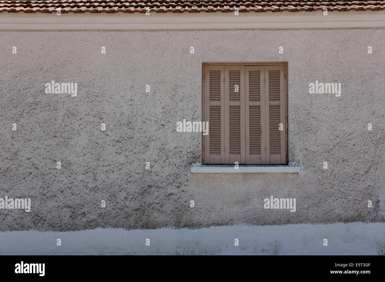 Closed window in Greece Stock Photo - Alamy