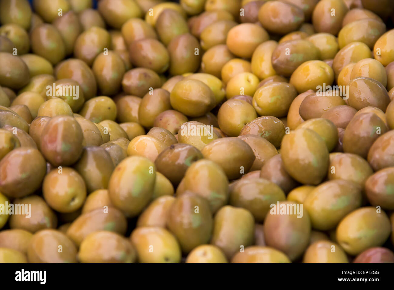 Lots of yellow olives Stock Photo - Alamy
