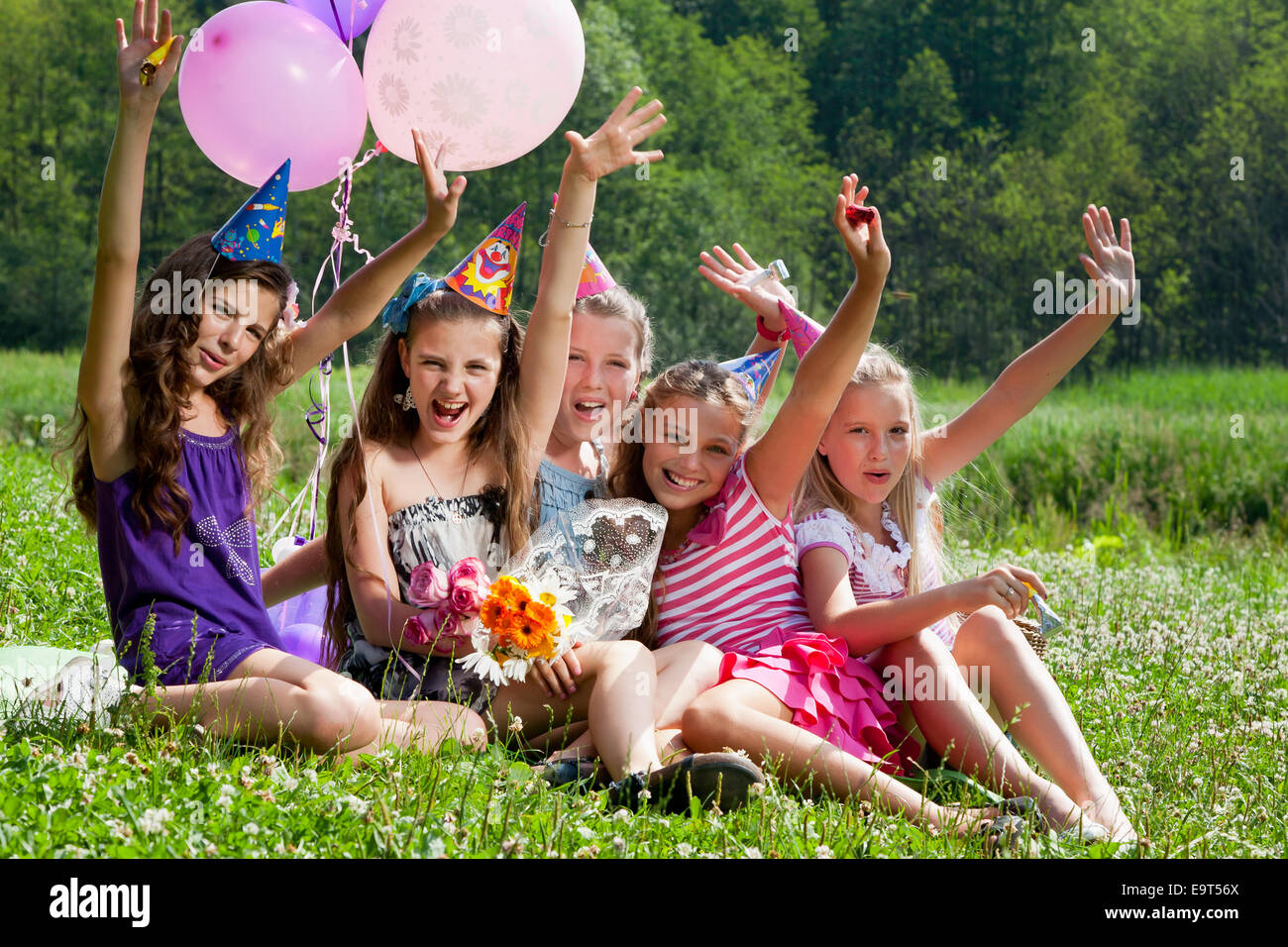 beautiful girls celebrate birthday in summer park outdoors Stock Photo ...