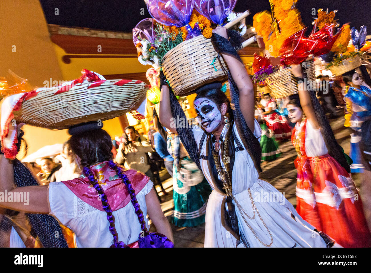 Costumed dancers at a Comparsa, or parade during the Day of the Dead ...