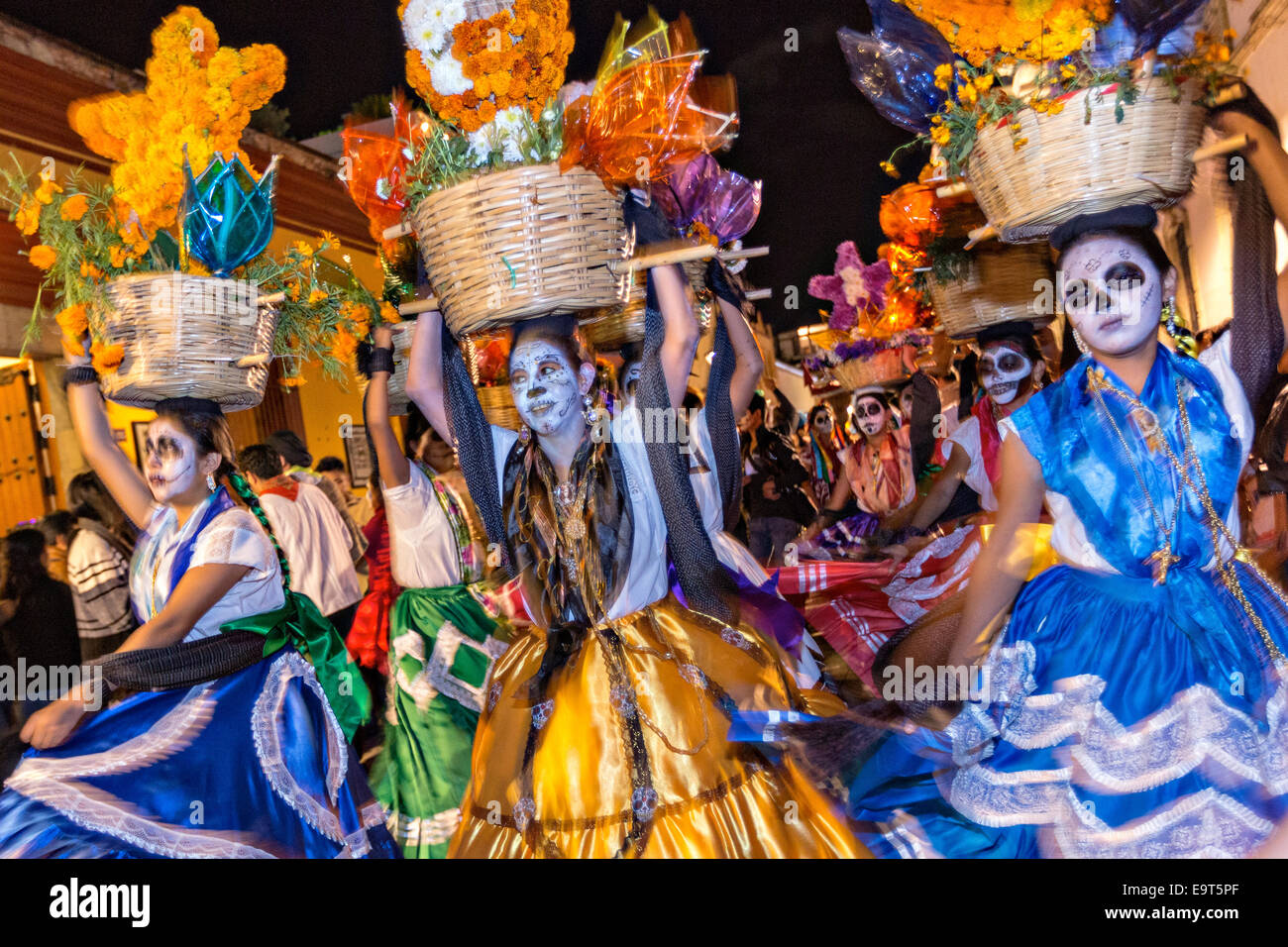 Costumed dancers at a Comparsa, or parade during the Day of the Dead ...
