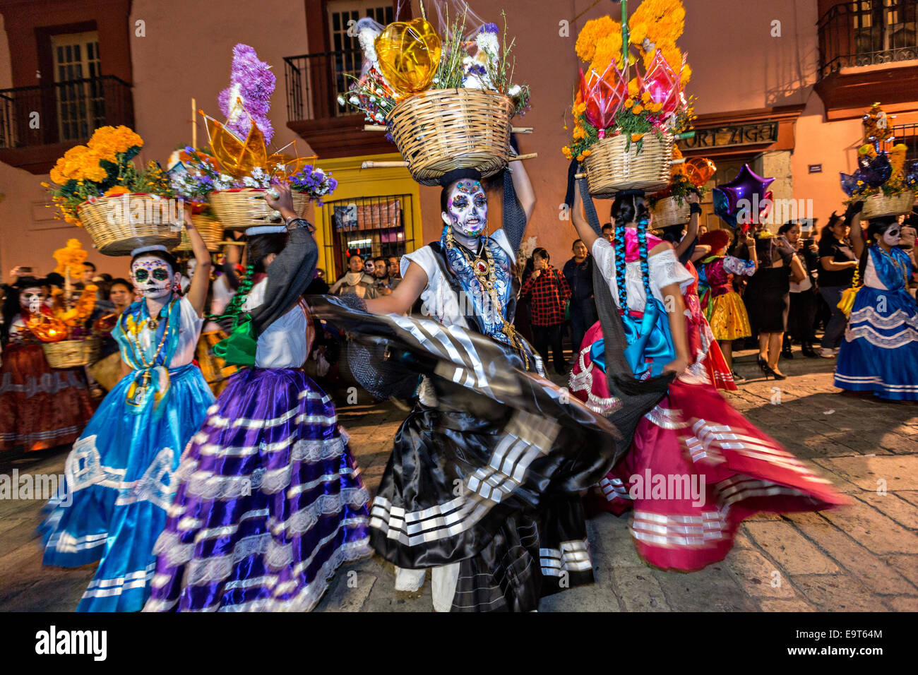 Costumed dancers at a Comparsa, or parade during the Day of the Dead ...