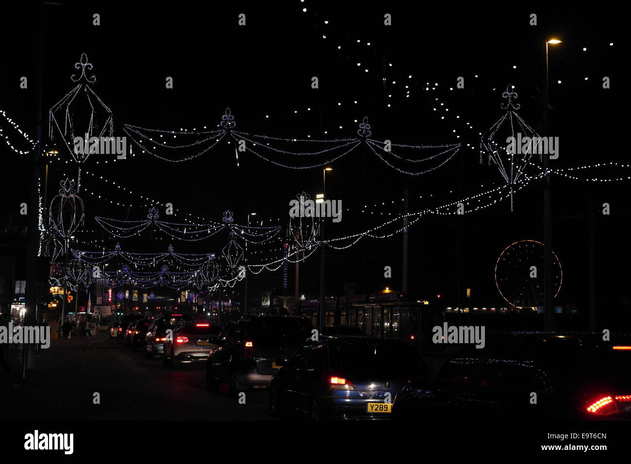 Night view, south to Central Pier 'Big Wheel' blue 'Bling' jewels above ...