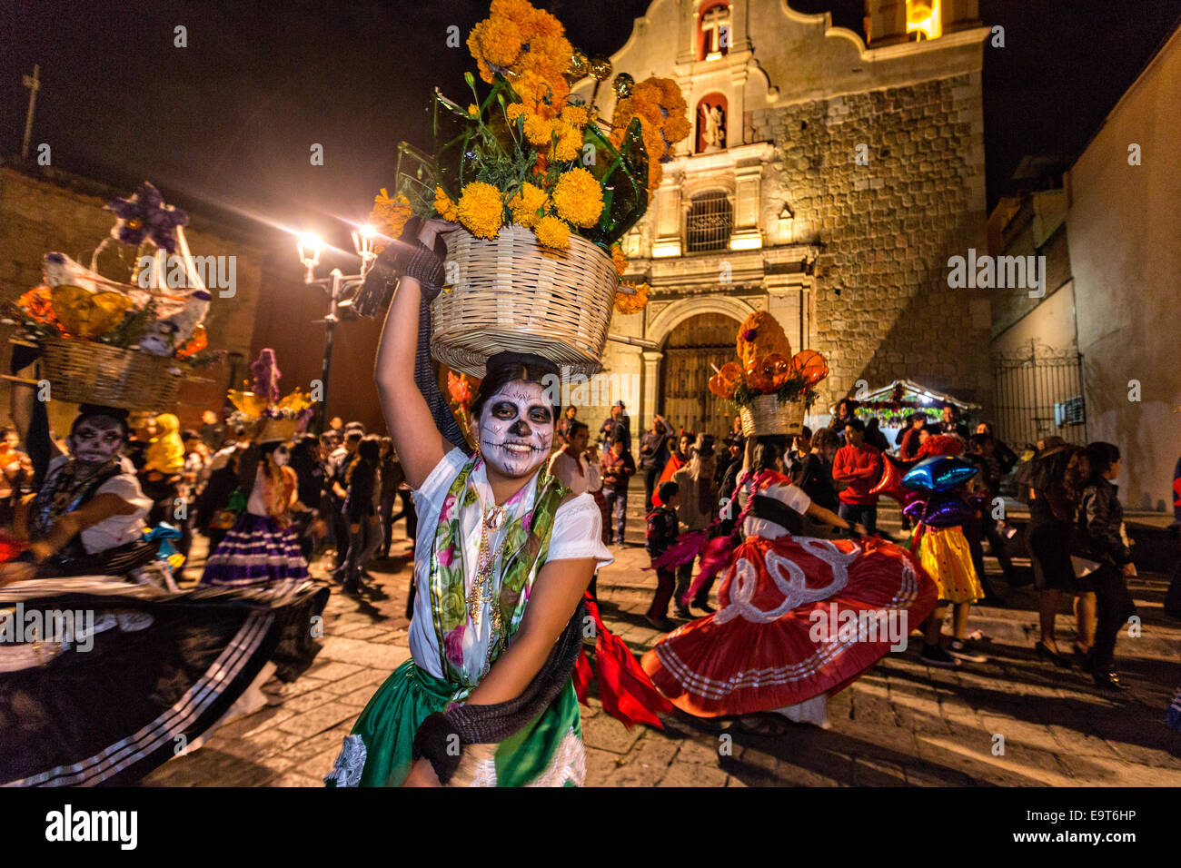 Costumed dancers at a Comparsa, or parade during the Day of the Dead ...