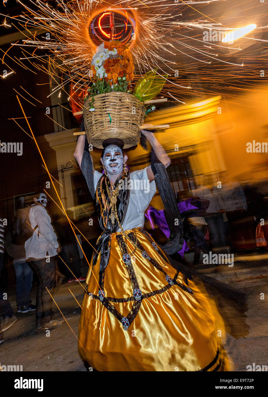 Costumed dancers with fireworks at a Comparsa, or parade during the Day ...