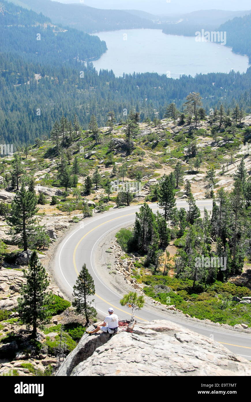Rock climber near Highway 40 over Donner Pass in Sierra Nevada ...