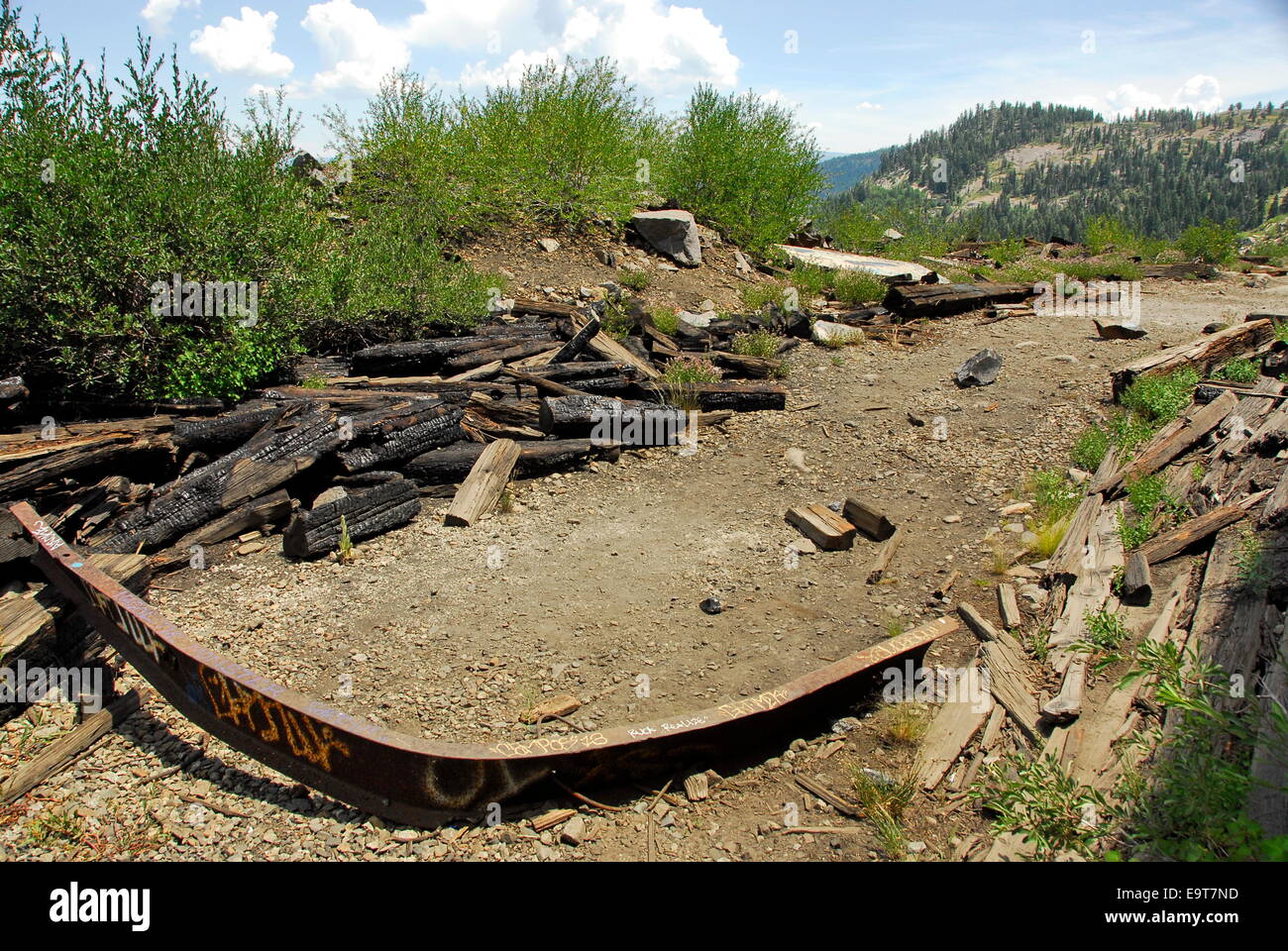 Burnt out railroad snowshed debris on Donner Pass in Sierra Nevada ...