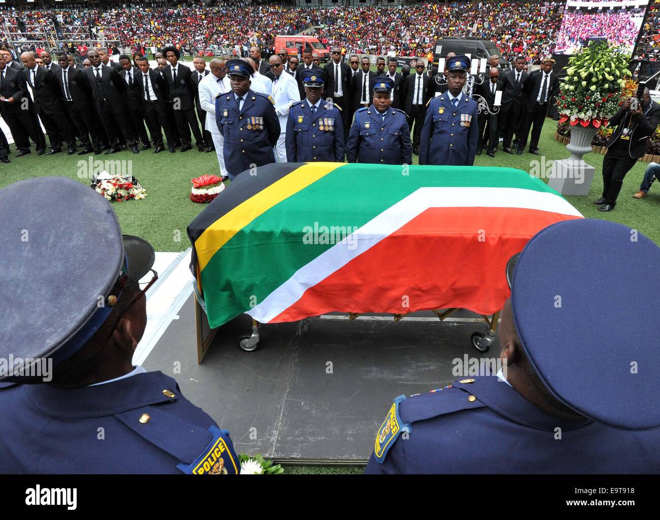 Durban, South Africa. 1st Nov, 2014. People stand in silent tribute to ...