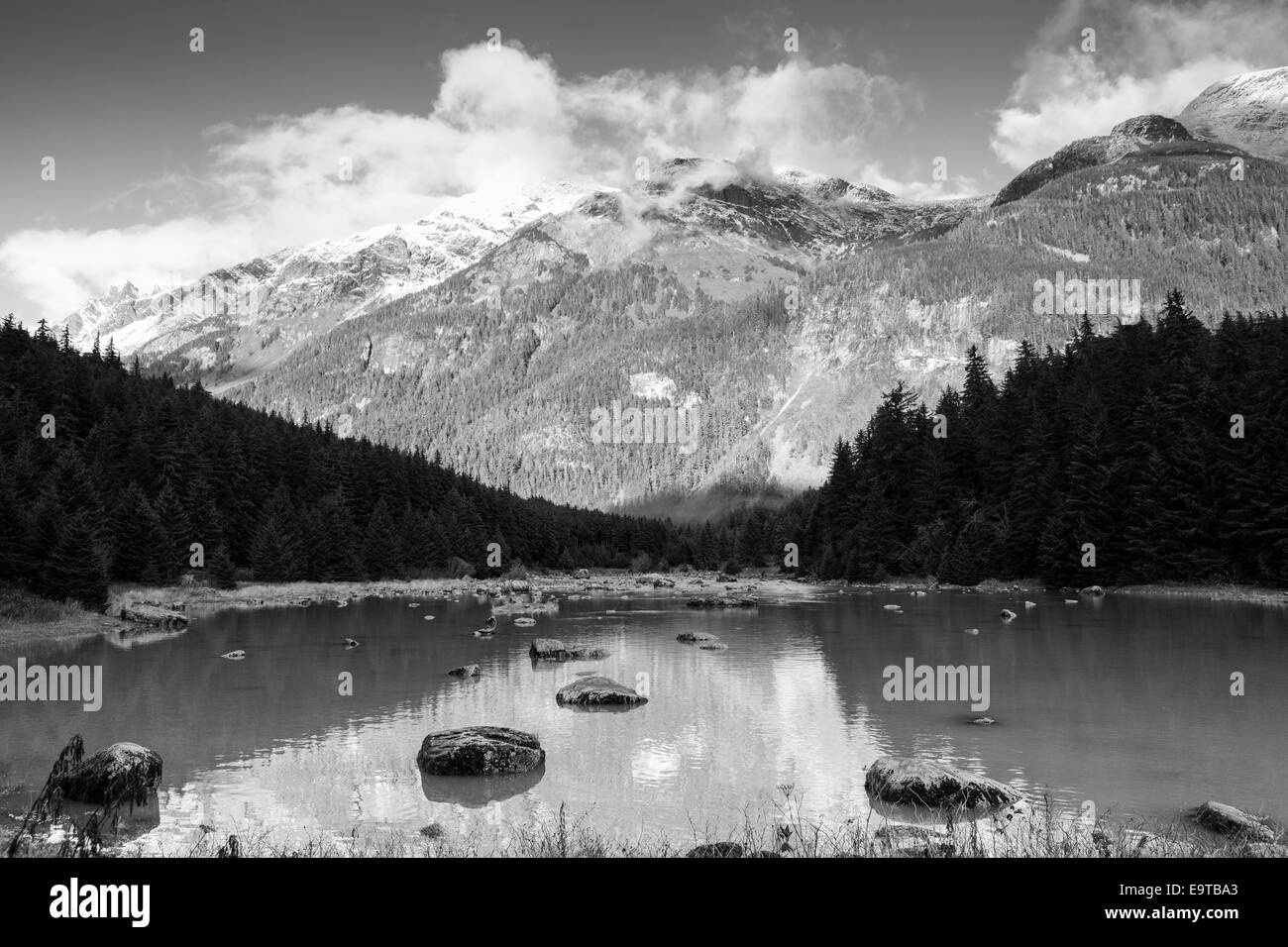 Chilkoot River near Haines Alaska in fall in black and white Stock ...