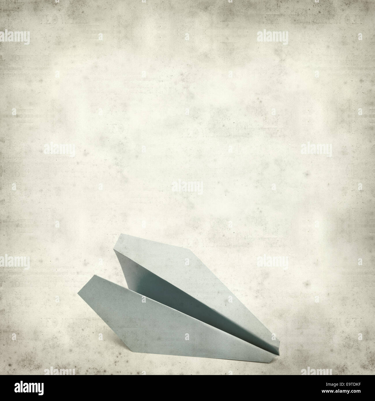 textured old paper background with paper plane Stock Photo - Alamy