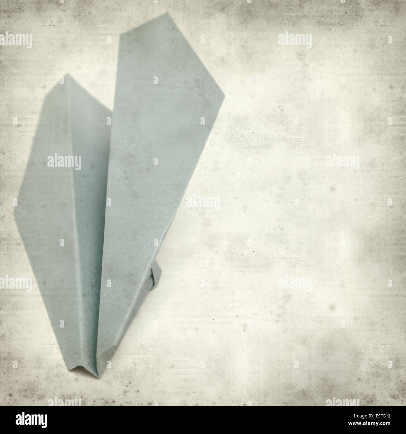 textured old paper background with paper plane Stock Photo - Alamy