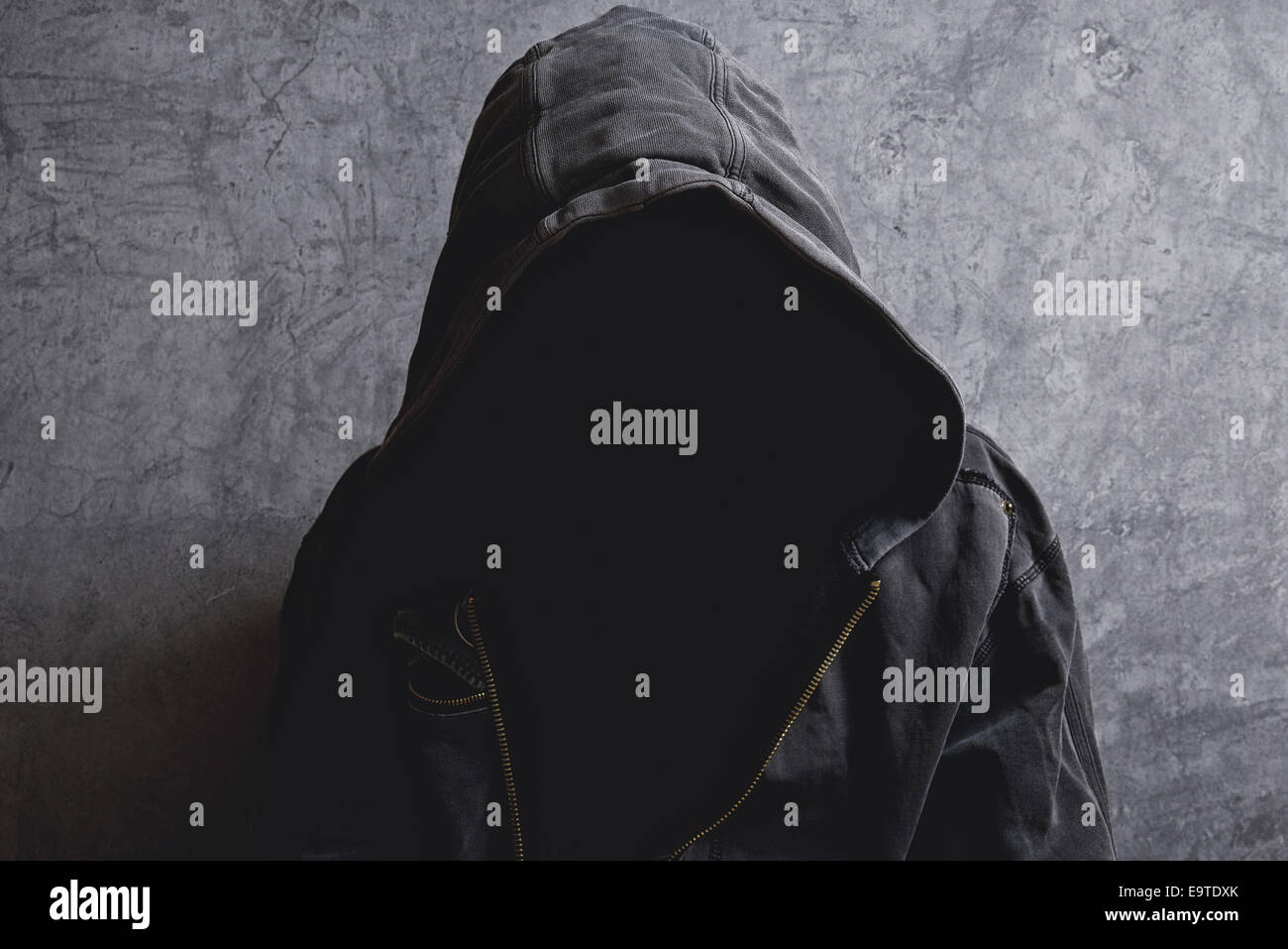 Faceless unknown and unrecognizable man without identity wearing hood ...