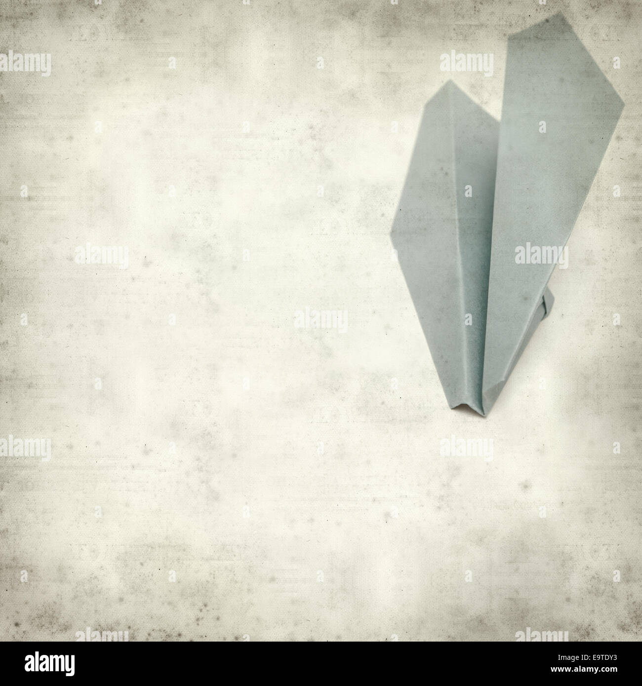 textured old paper background with paper plane Stock Photo - Alamy