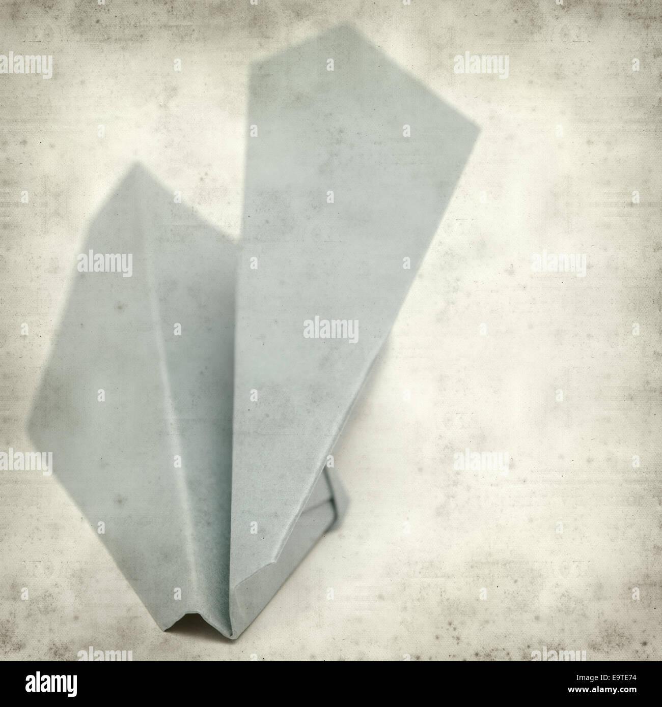 textured old paper background with paper plane Stock Photo - Alamy