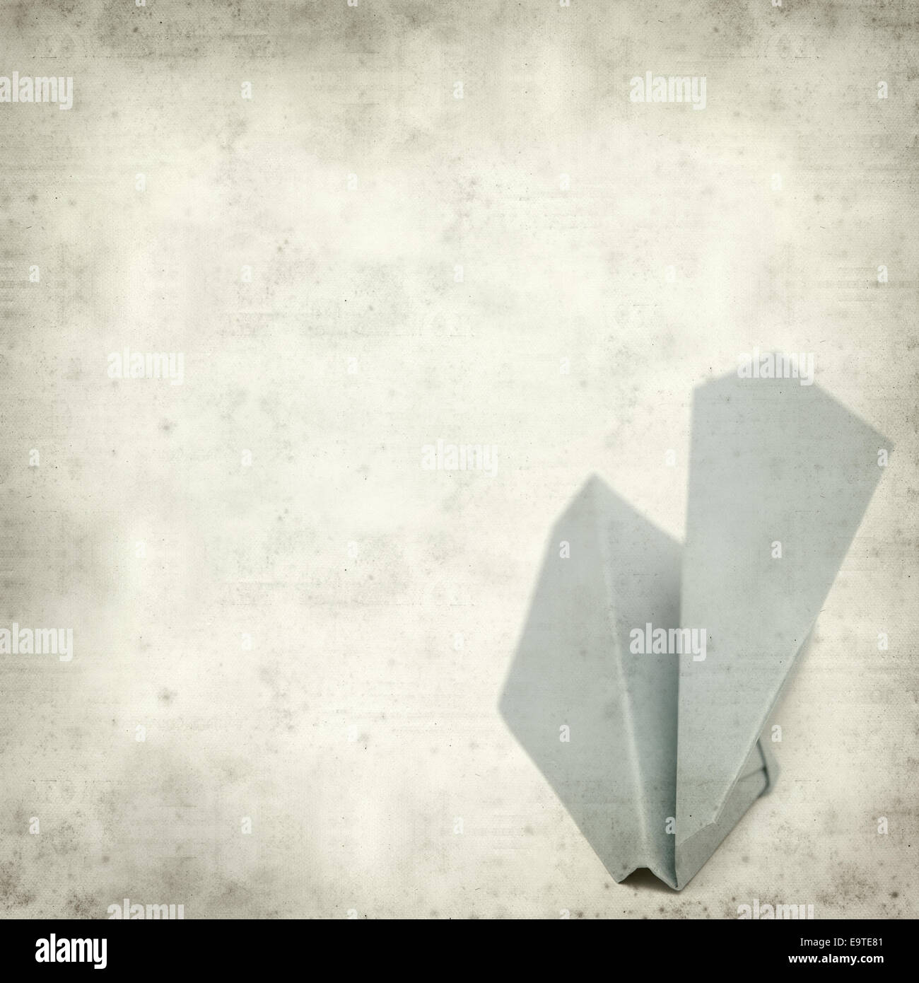 textured old paper background with paper plane Stock Photo - Alamy
