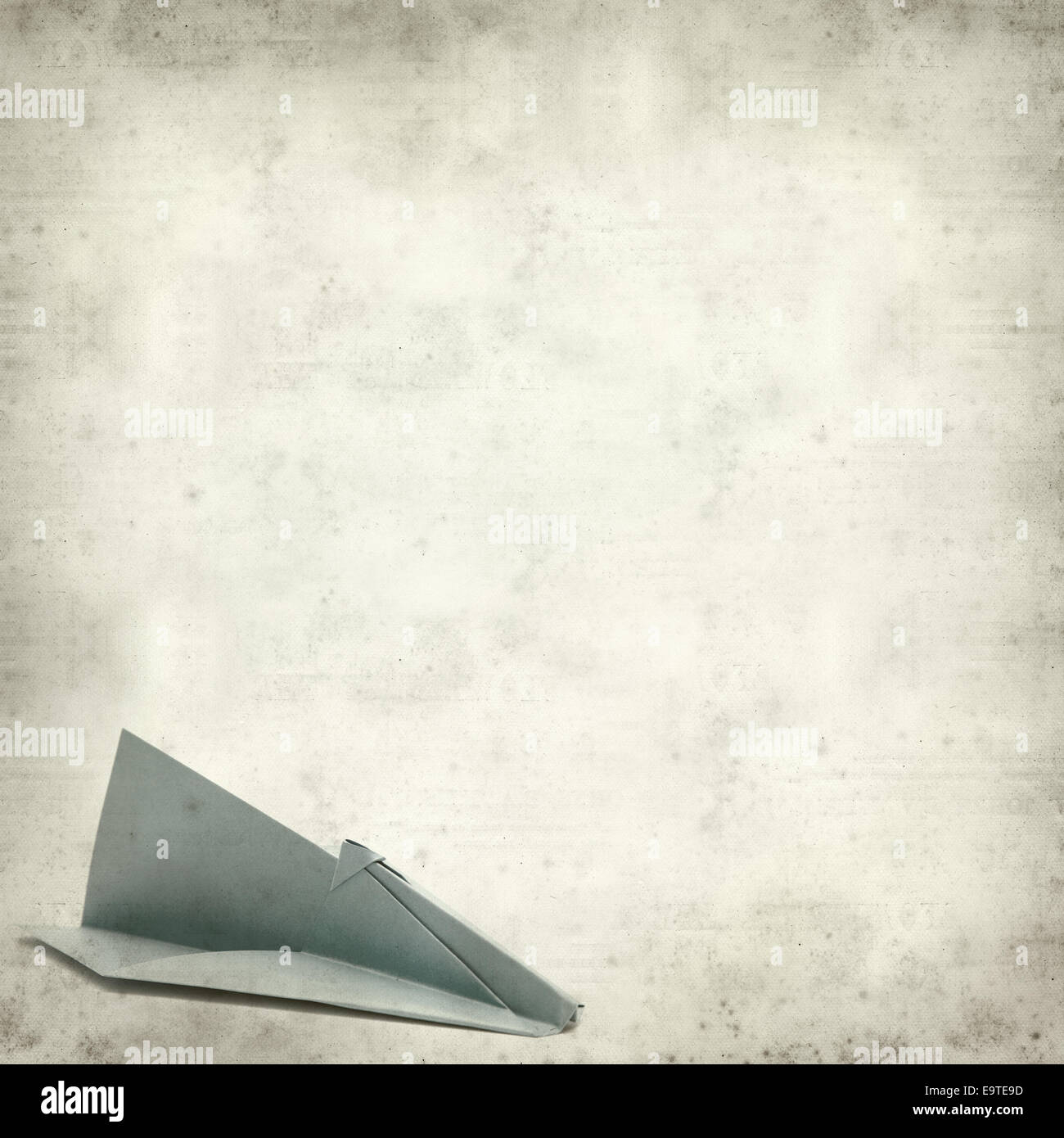 textured old paper background with paper plane Stock Photo - Alamy