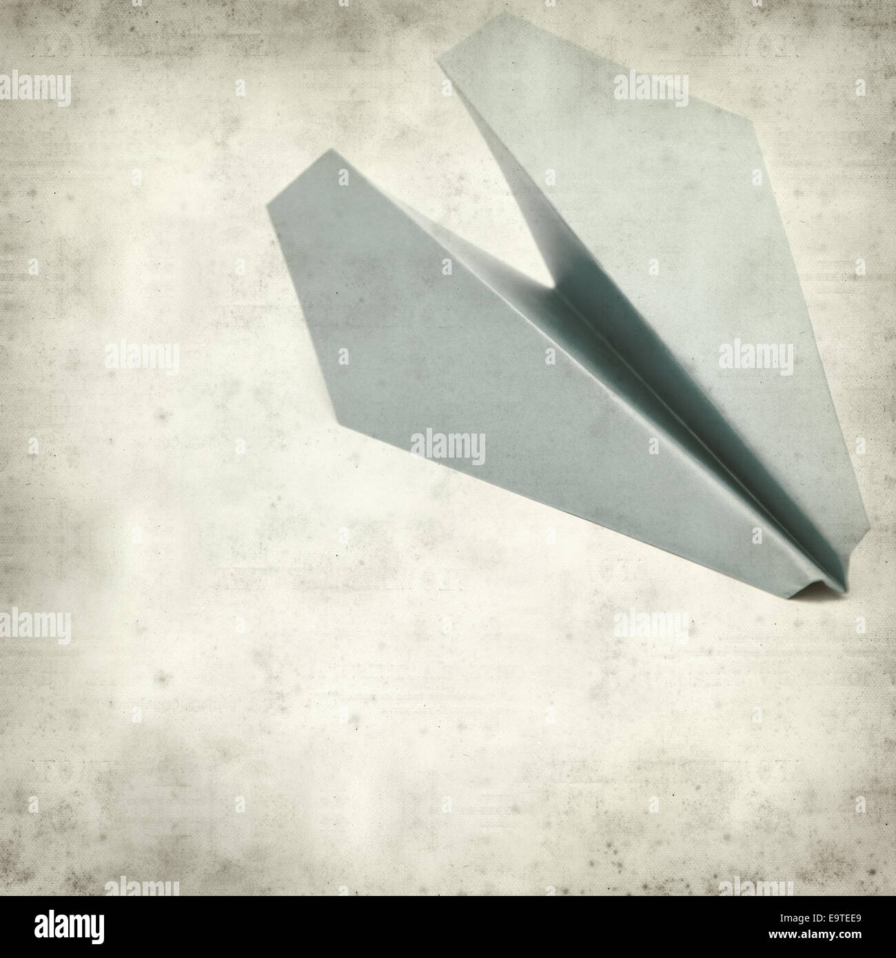 textured old paper background with paper plane Stock Photo - Alamy