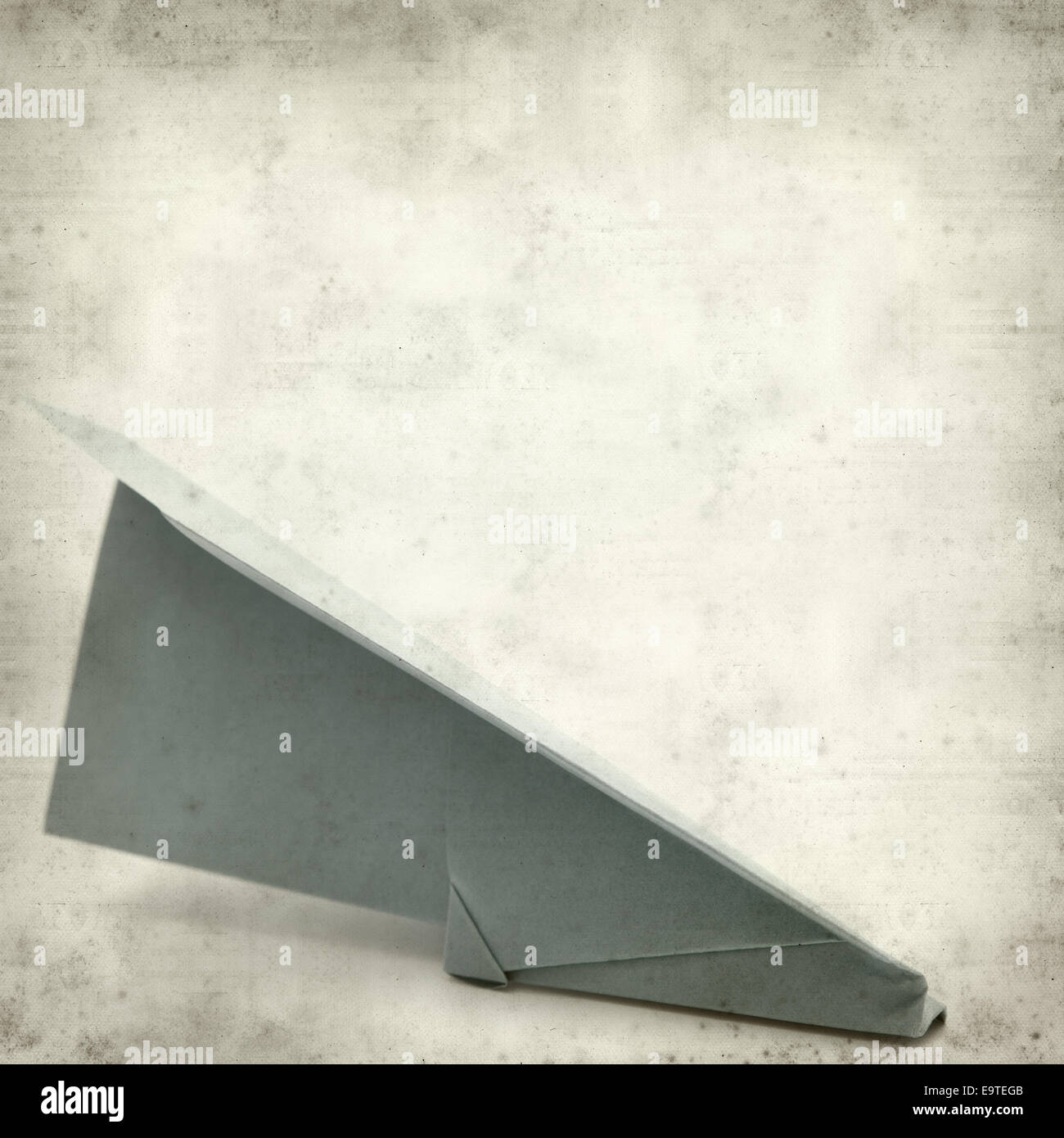 textured old paper background with paper plane Stock Photo - Alamy