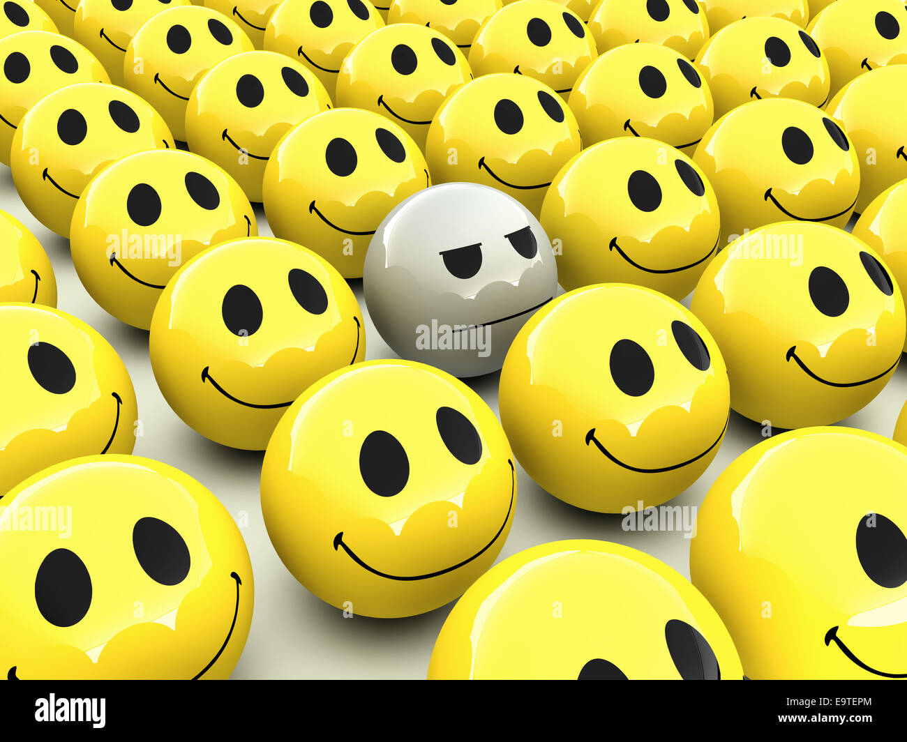 3d render of a field of yellow smileys with one sad gray one Stock ...