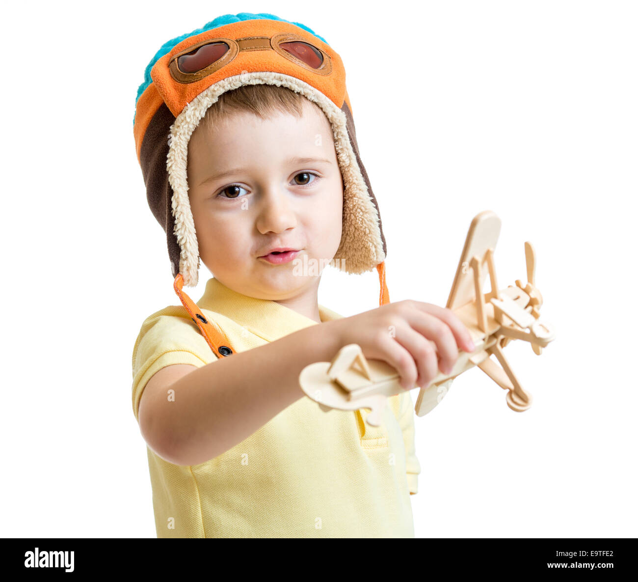 happy kid boy pilot and playing with wooden airplane toy Stock Photo ...