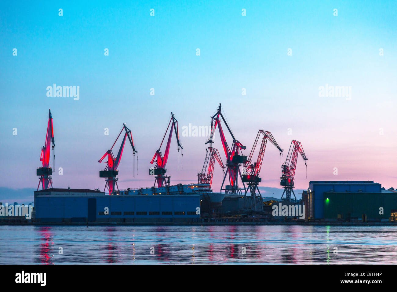 Port warehouse with cargoes Stock Photo - Alamy