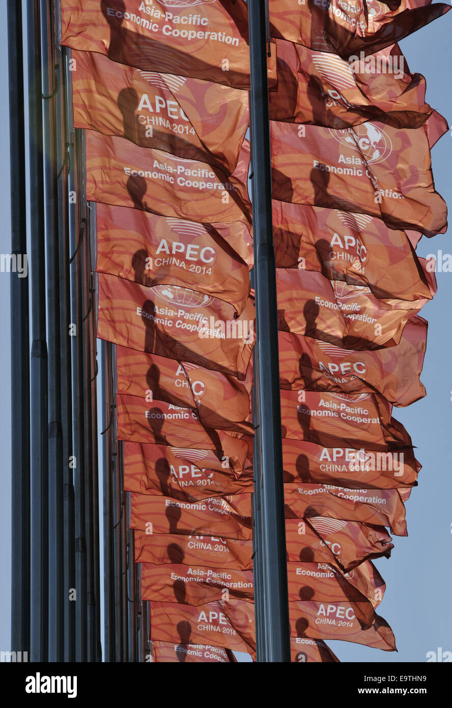 Beijing, China. 2nd Nov, 2014. APEC flags flutter in the wind outside ...
