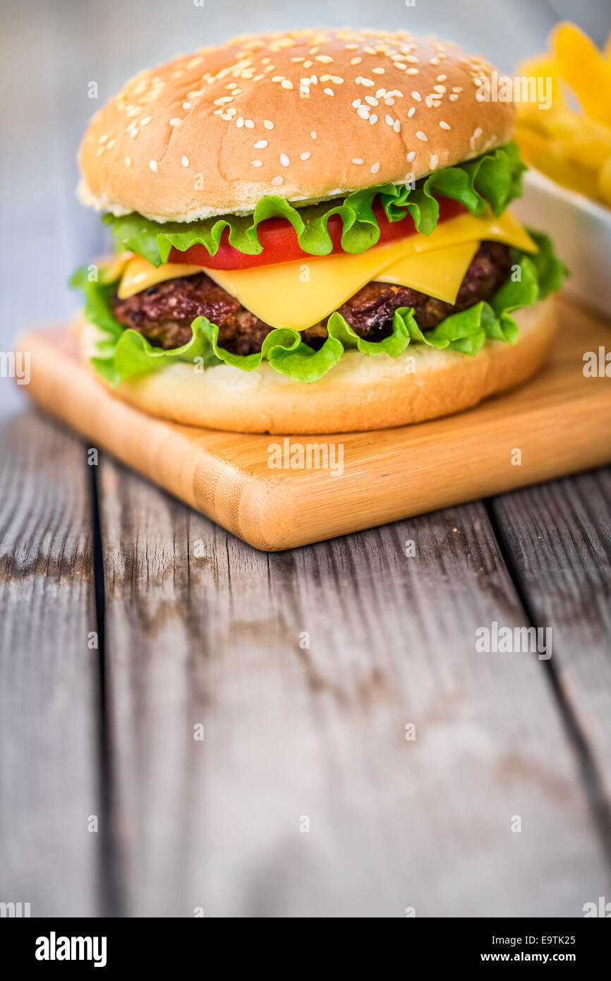 Tasty and appetizing hamburger cheeseburger Stock Photo - Alamy