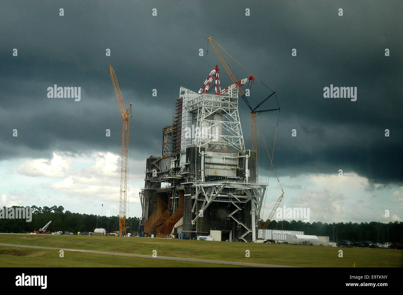 The B-2 Test Stand at Stennis Space Center is seen as dark clouds loom ...
