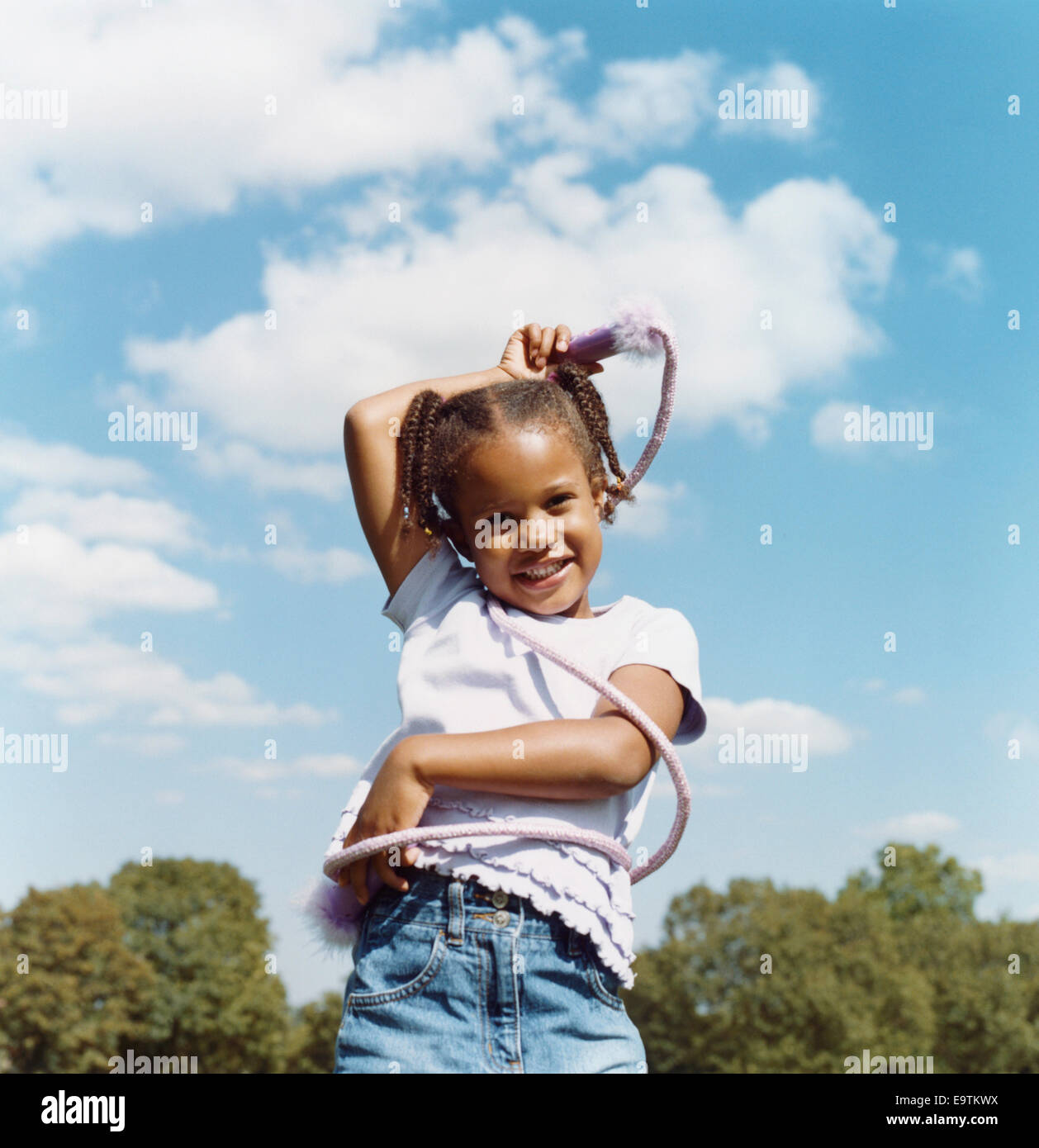 Girl with skipping rope hi-res stock photography and images - Alamy