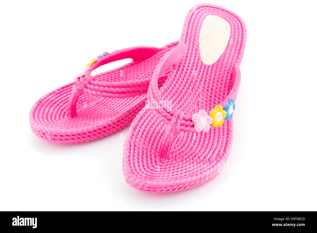 Pink flip flops isolated on white background Stock Photo - Alamy