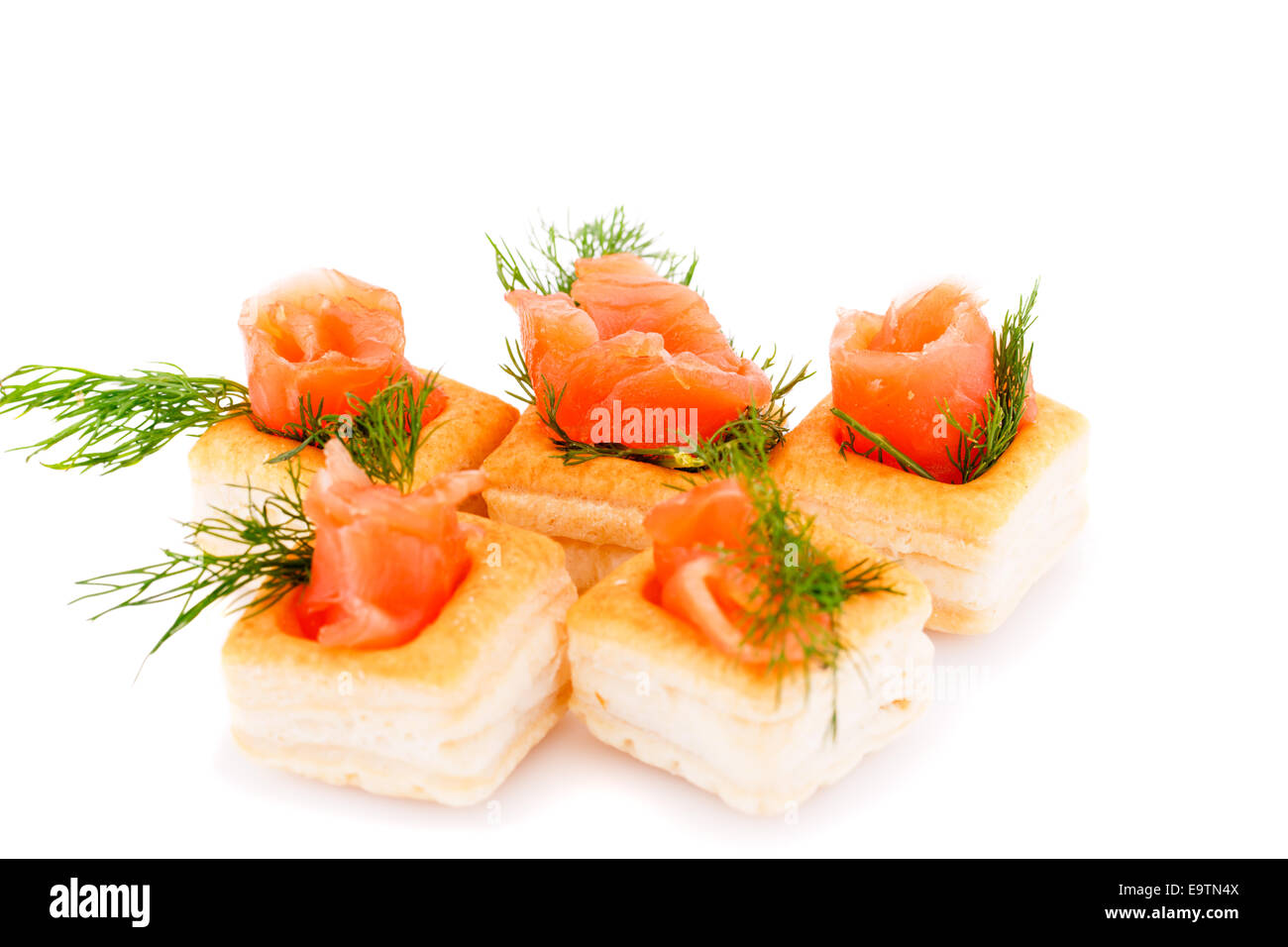 Salmon rolled fillet in pastries isolated on white background Stock ...
