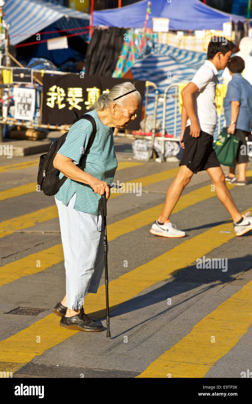 Senior Chinese Woman Crossing Hennessy Road, Causeway Bay, Hong Kong ...