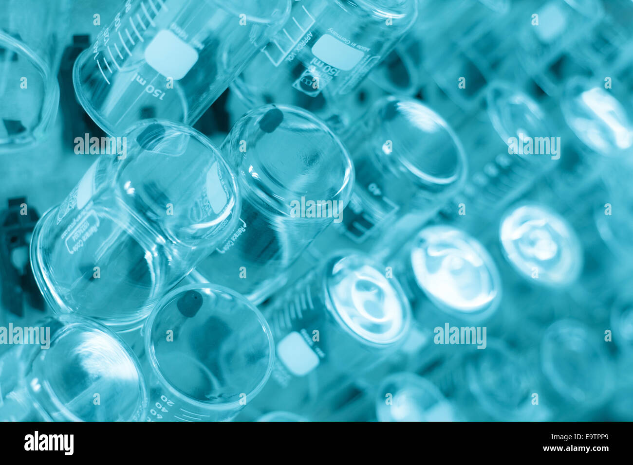 Rows of beaker on a drying rack in a chemistry lab Stock Photo - Alamy