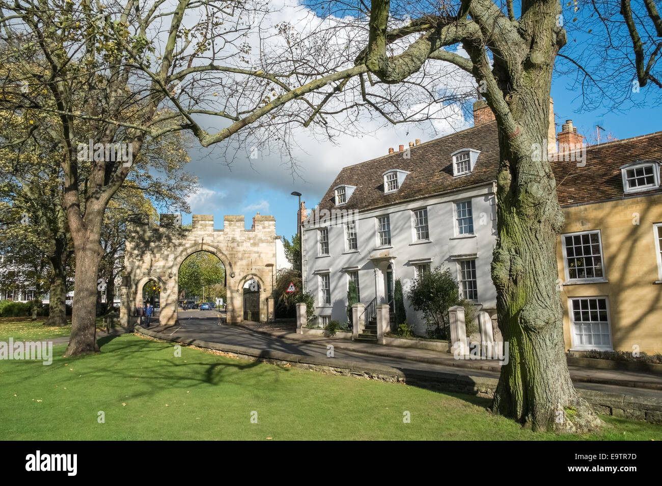 Historic Priory Gate arch and terraced houses, Priory Gate, Lincoln ...