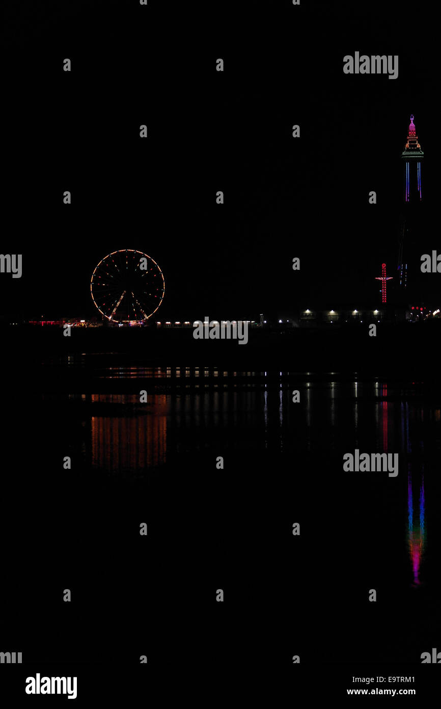 Blackpool tower red green colours illuminated standing rising centre ...