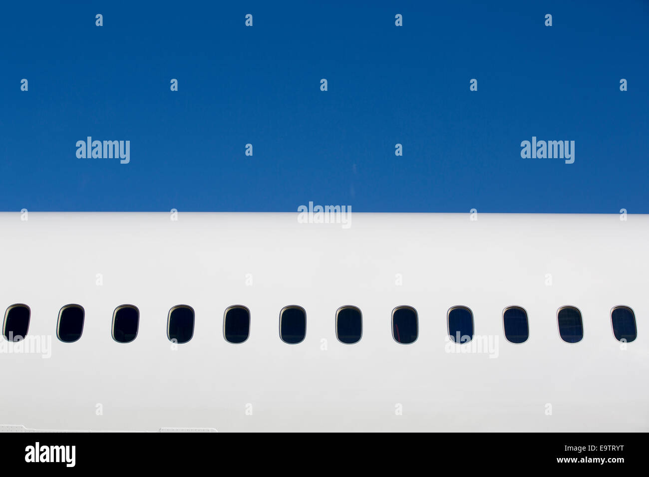 787 Dreamliner carriage windows against a blue sky Stock Photo - Alamy