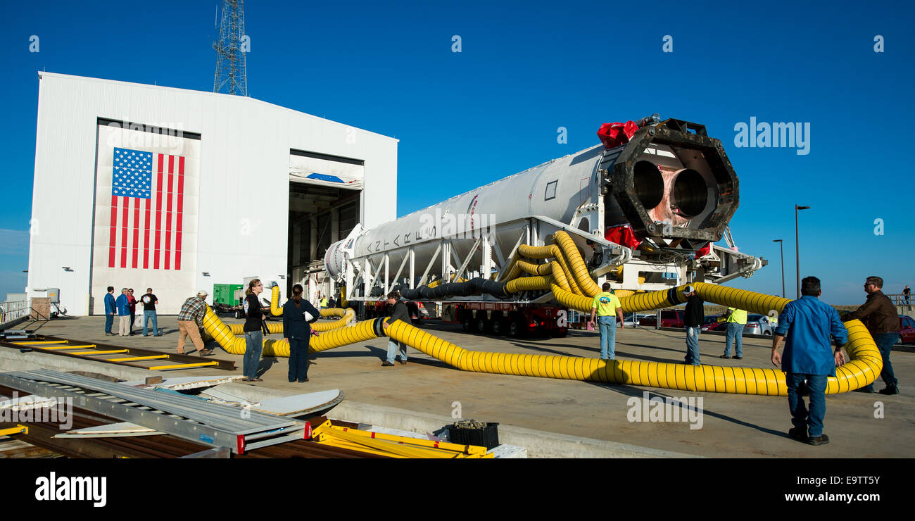 The Antares rocket carrying the Cygnus spacecraft was rolled out to ...
