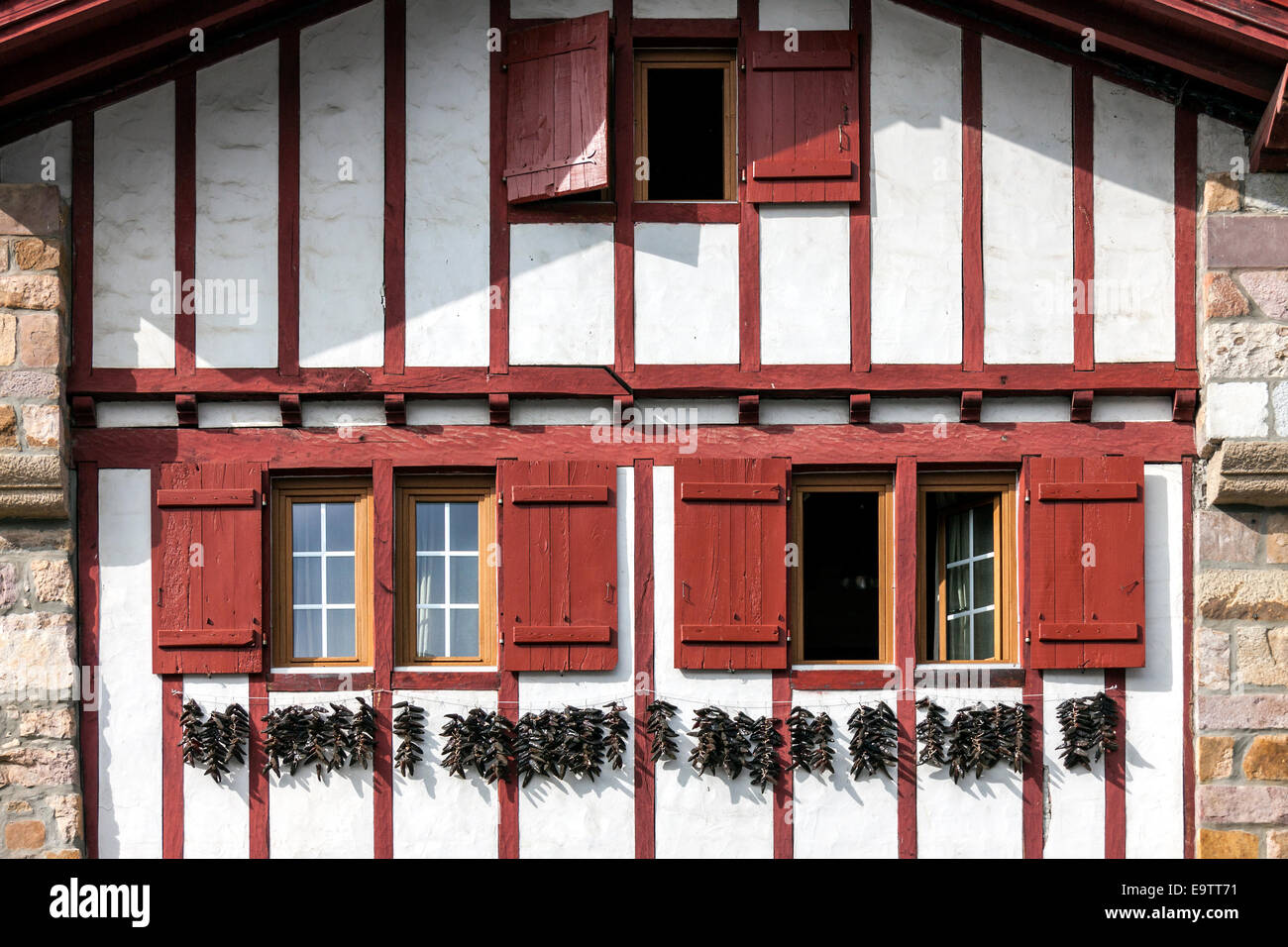 A section of the front of a traditional Basque house in Espelette ...