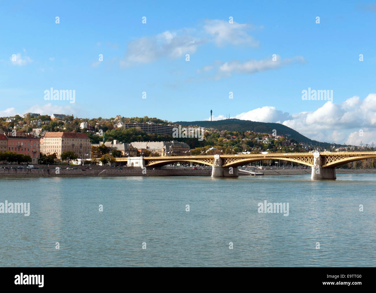 Margit (Margaret) Bridge over the Danube river, with the Buda hills in ...