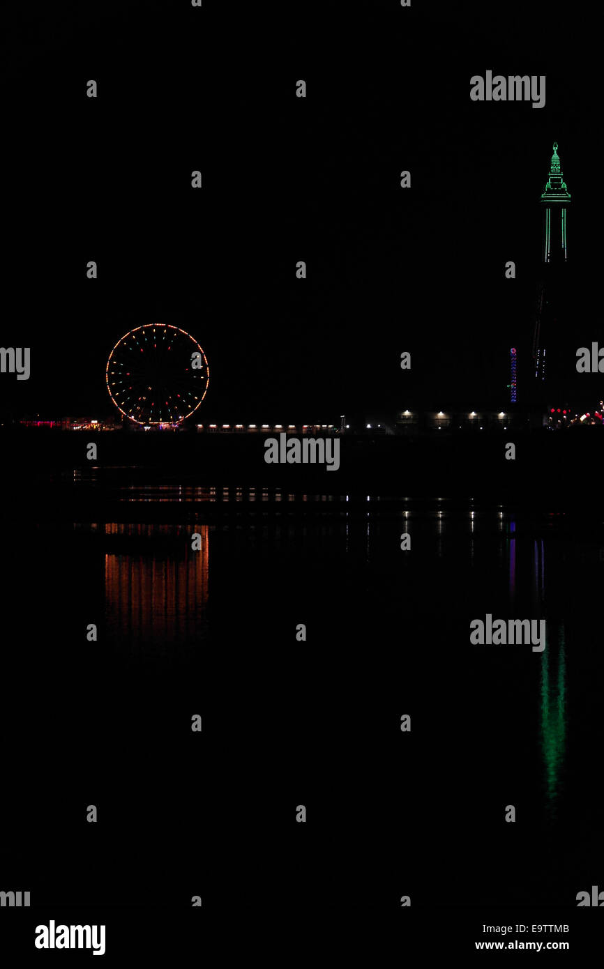Blackpool tower red green colours illuminated standing rising centre ...